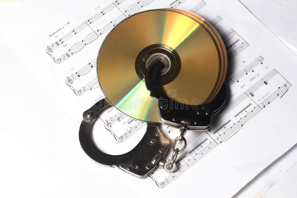 CD or DVD with Musical Note with Handcuff Stock Photo - Image of bluray ...