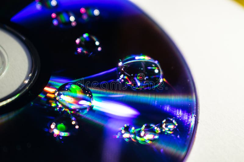Cd dvd with water drops stock photo. Image of reflection - 107093266