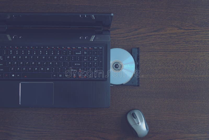 Cd Inserted into a Laptop 3 Editorial Stock Image - Image of multimedia ...