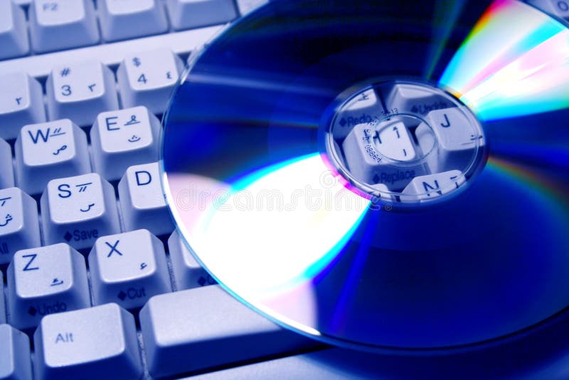 CD s & keyboard stock image. Image of computer, jewel - 3084301