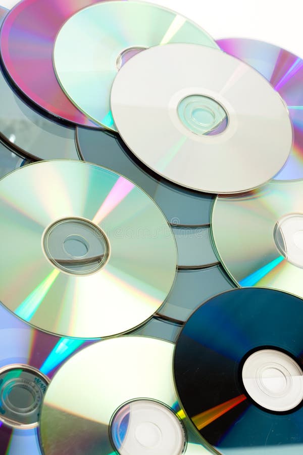 Pile of Many CDs or DVDs stock photo. Image of backgrounds - 2134864