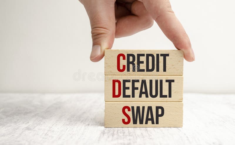 CDS Credit Default Swap Words on Wooden Blocks and Hand Stock Photo ...