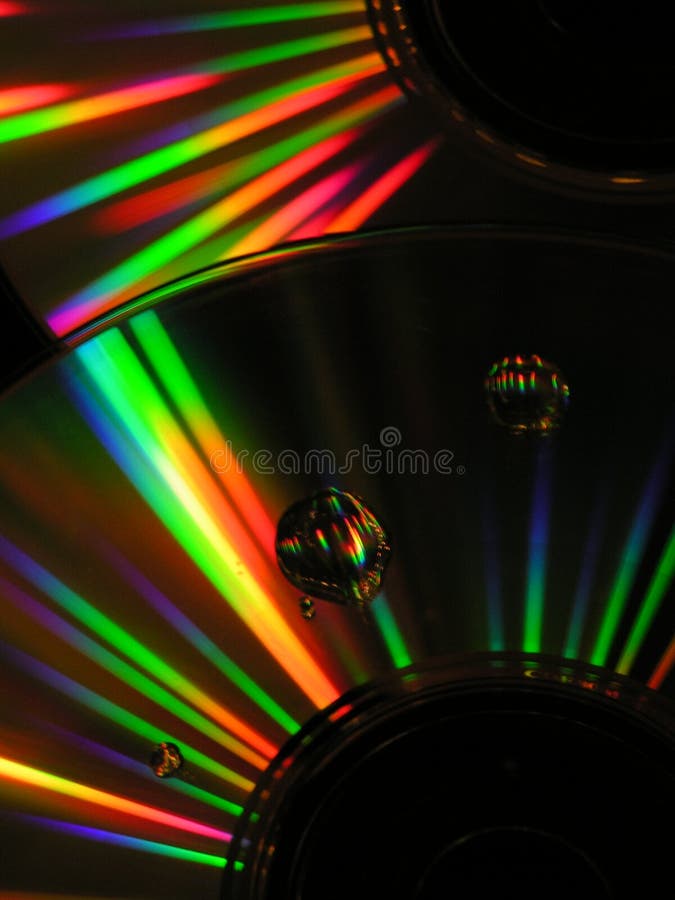 Cds with drops of water stock photo. Image of colour, technology - 241356