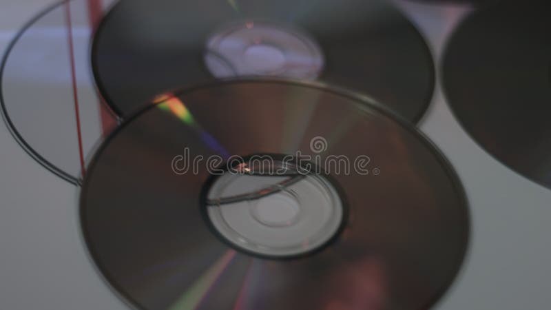 CDs Shine & Reflect on Slowly Rotating White Background 4K Stock Video ...