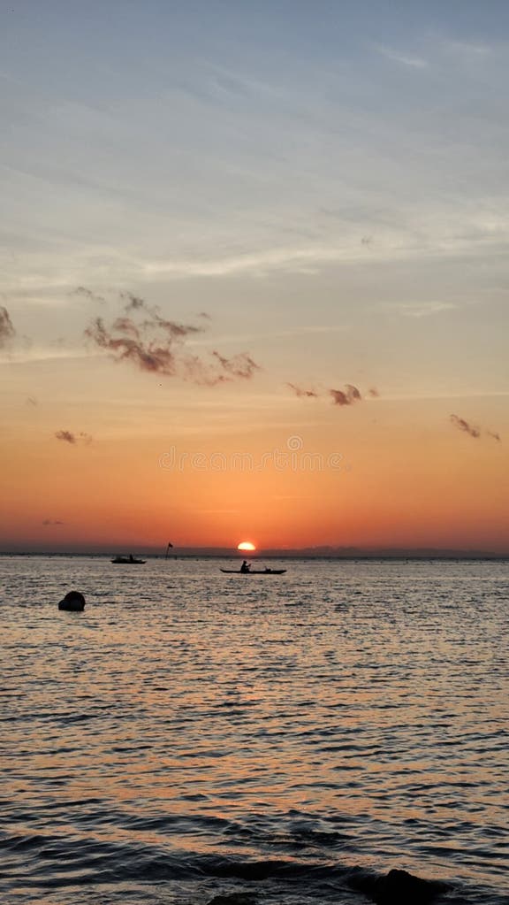 Cebu summer sunrise stock photo. Image of barefoot, orange - 331358322
