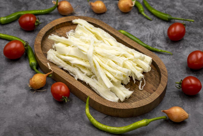 Cecil Cheese or String Cheese on a Dark Floor. Delicious Assortment of ...