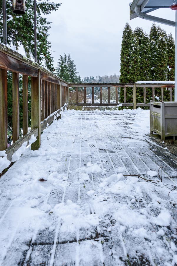 Cedar Deck after Snow Shoveled Off, Stormy Snow Day Stock Photo - Image ...