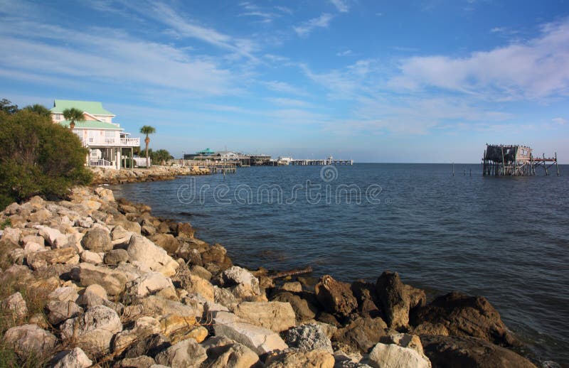 Cedar Key shoreline stock photo. Image of rocks, water - 11879006