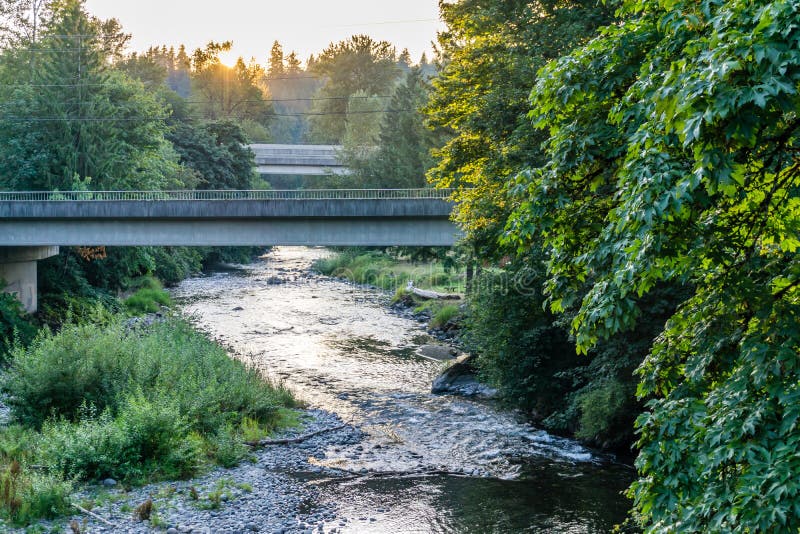 Cedar River and Highway 2 stock photo. Image of rocks - 156065810