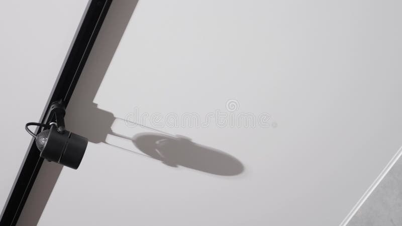 Ceiling Black Spotlights on a Rail System on a White Ceiling Background ...