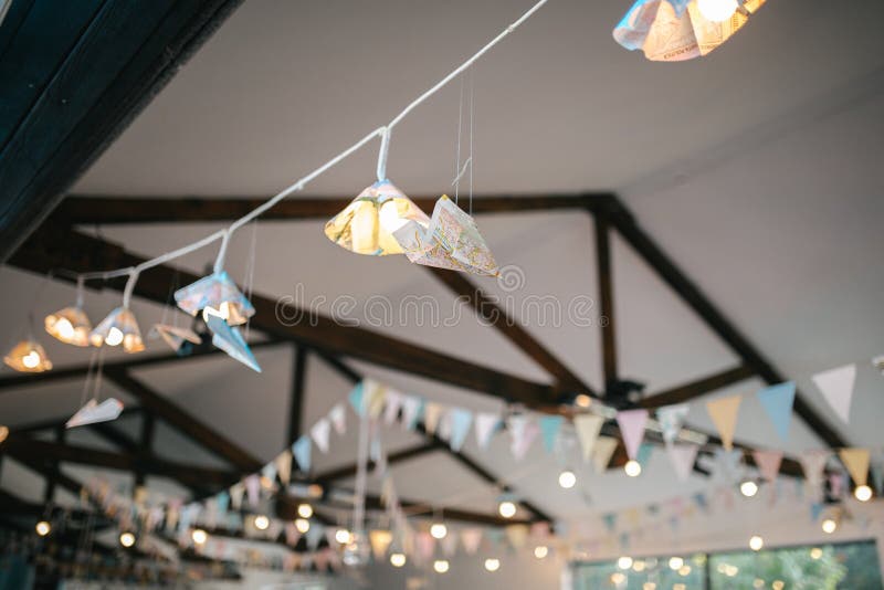 Ceiling Decoration with Paper Flags and Lightbulbs Stock Photo - Image ...