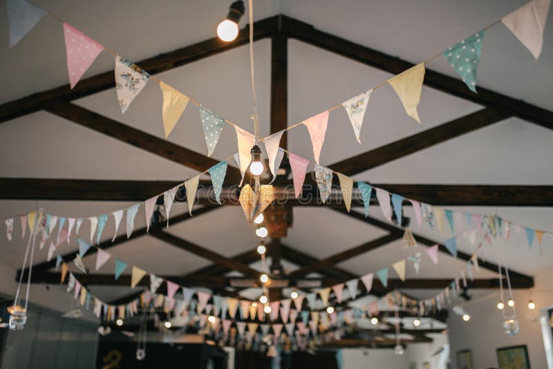 Ceiling Decoration with Paper Flags and Lightbulbs Stock Photo - Image ...