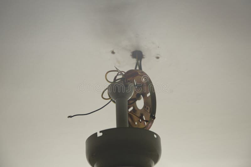A Ceiling Fan that Has Come Loose and Has Caused an Electrical Fire ...