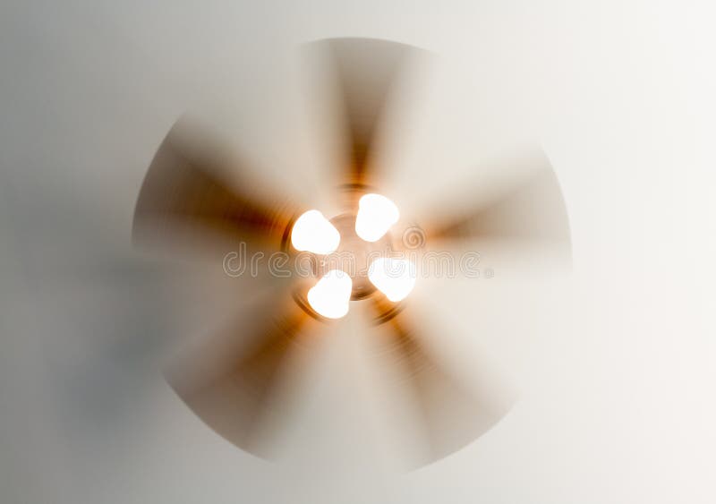 Ceiling Fan in Motion stock image. Image of wicker, brown - 219733379