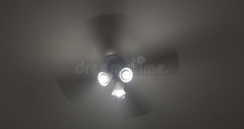Ceiling Fan Spinning on Studio Blue Background Stock Video - Video of ...