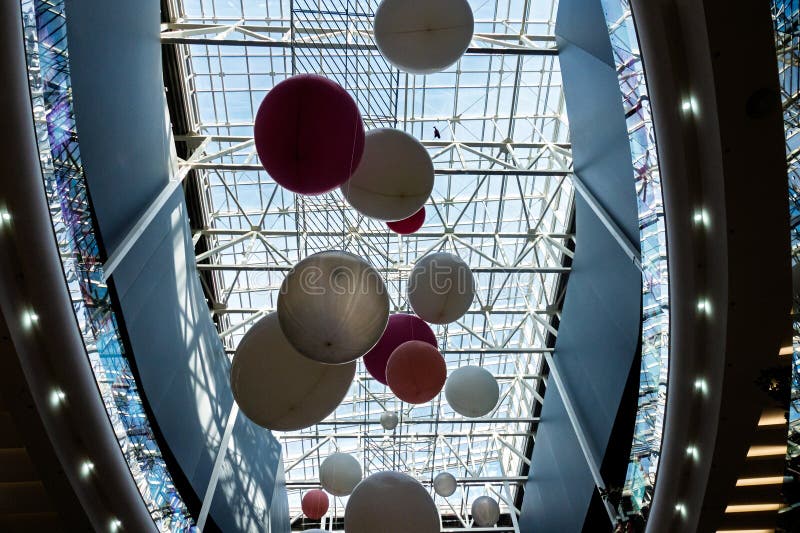 Ceiling Featuring Colorful Decorative Spheres in a Light and Airy ...