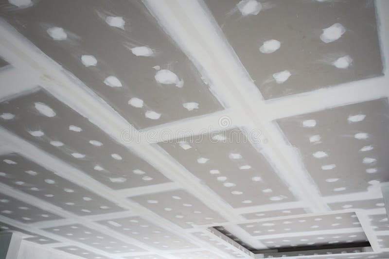 Ceiling Gypsum Board Installation at Construction Site Stock Photo ...