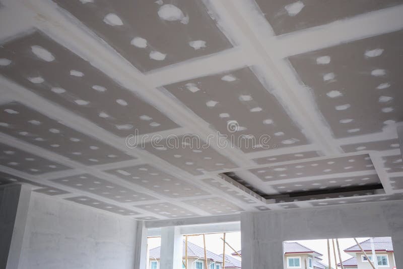 Ceiling Gypsum Board Installation at Construction Site Stock Photo ...