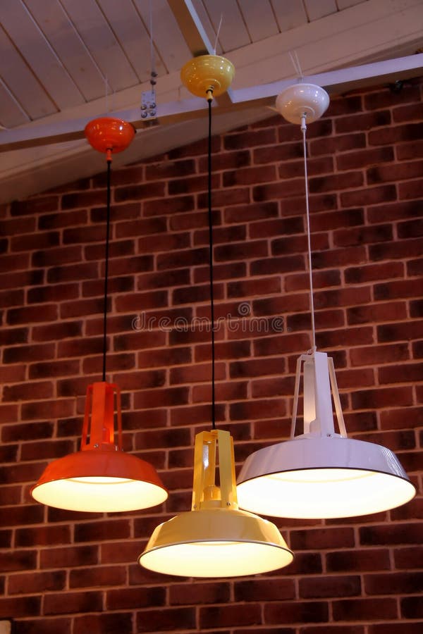 Light Store. Round Lamps on Wires Hanging from the Ceiling Stock Photo ...