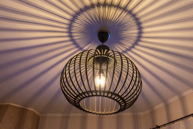 Ceiling Light with Light Rays Creating an Effect on the Wall Stock ...