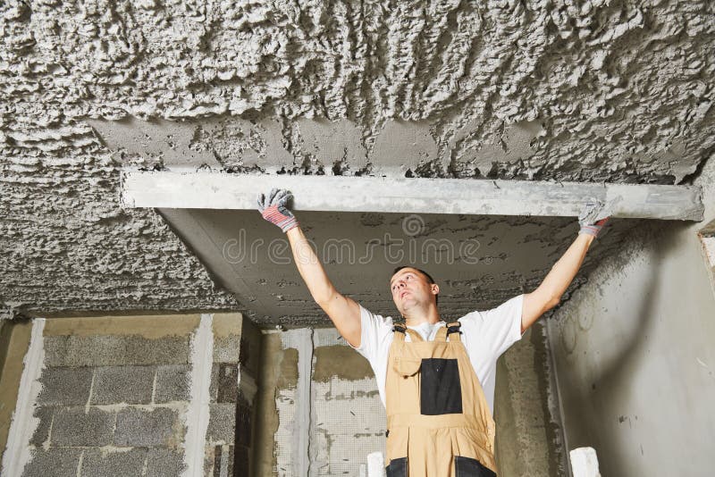 Plasterer Smoothing Plaster Mortar on Ceiling with Screeder Stock Image ...