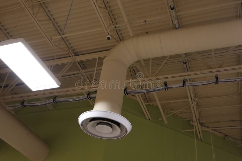 Ceiling Structure with AC Duct and Industrial Lights Up Close Stock ...