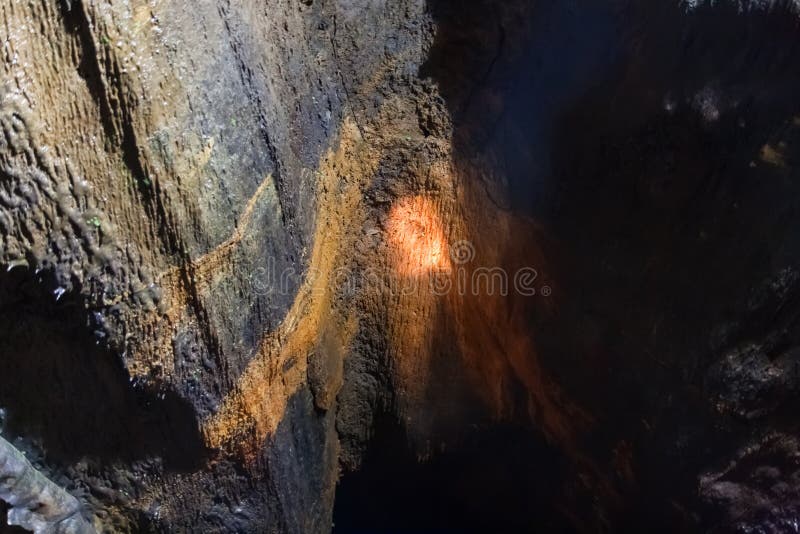 The Ceiling and Walls of the Lava Cave are Covered with a Red Organic ...