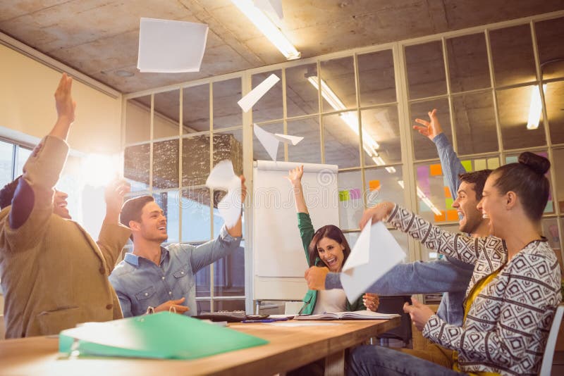 Celebrating Business People Throwing Papers in the Air Stock Image ...