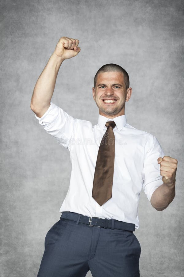 Man Celebrating Succes with Hands Stretched Out on Bright City View at ...