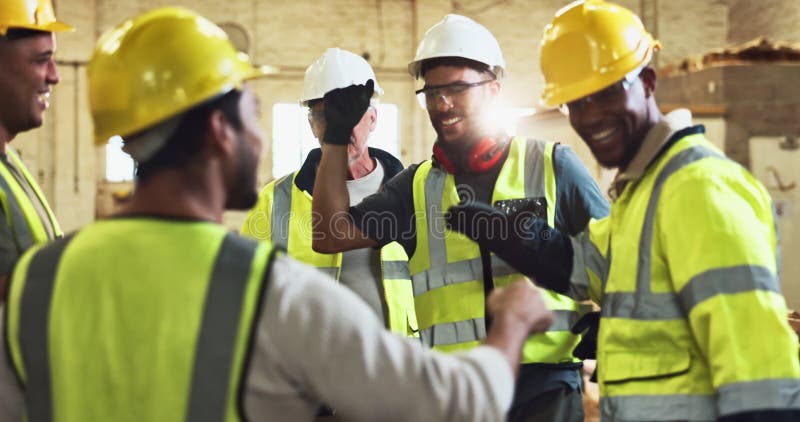 Celebration, Construction and Handshake with Warehouse Team in Workshop ...