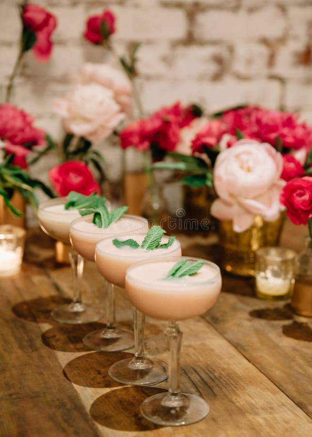 An Array of Pink-colored Alcoholic Drinks Ready To Be Served Stock ...