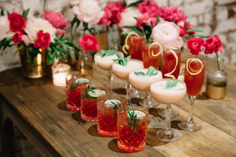 An Array of Pink-colored Alcoholic Drinks Ready To Be Served Stock ...
