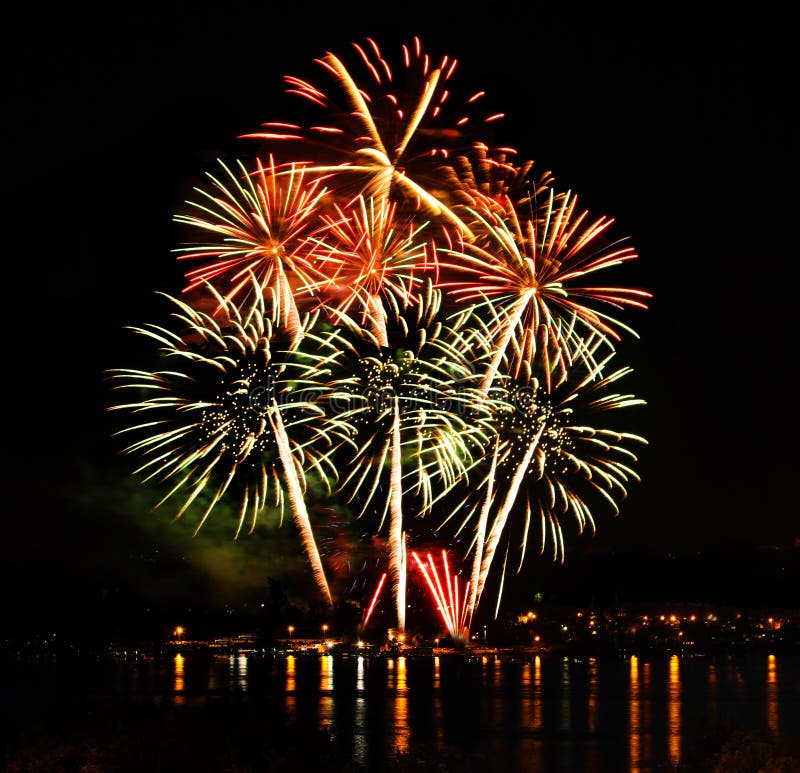 Celebratory Firework in a Night Sky Stock Photo - Image of explosion ...