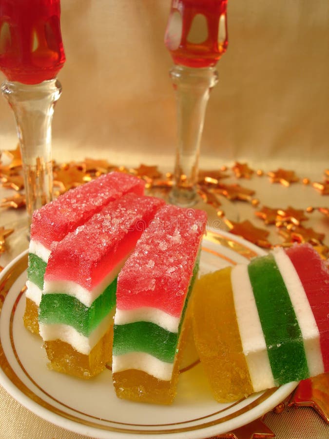 Celebratory Table (Color Jelly Cake On Plate And Two Red Glasses ...