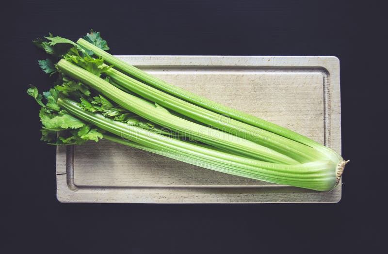 Celery Branch Bunch on a Cutting Board Stock Photo - Image of diet ...
