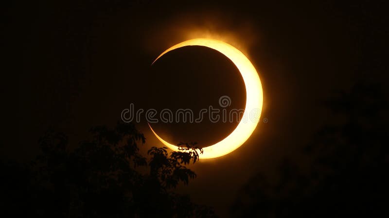Celestial Eclipse Viewed at Night Showcasing a Brilliant Crescent Moon ...