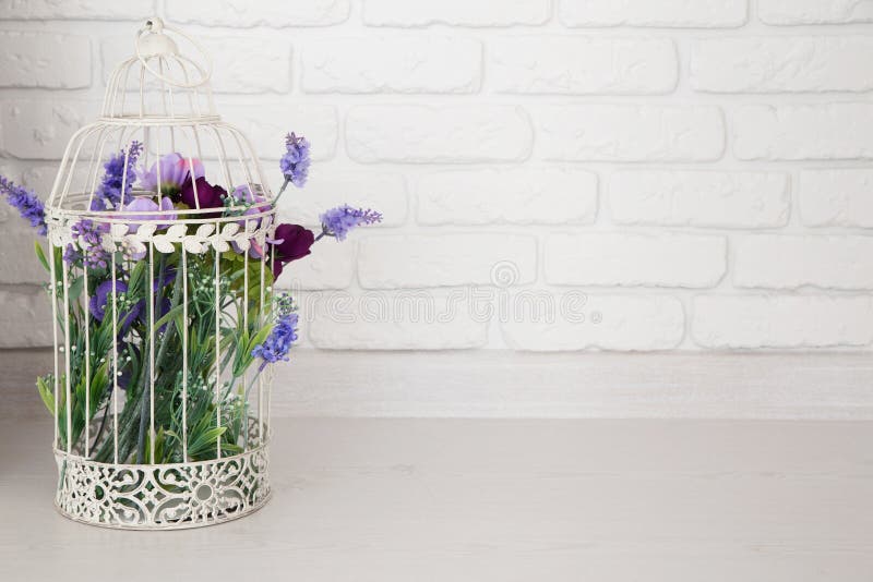 Cell with Flowers and White Brick Wall Stock Image - Image of bouquet ...