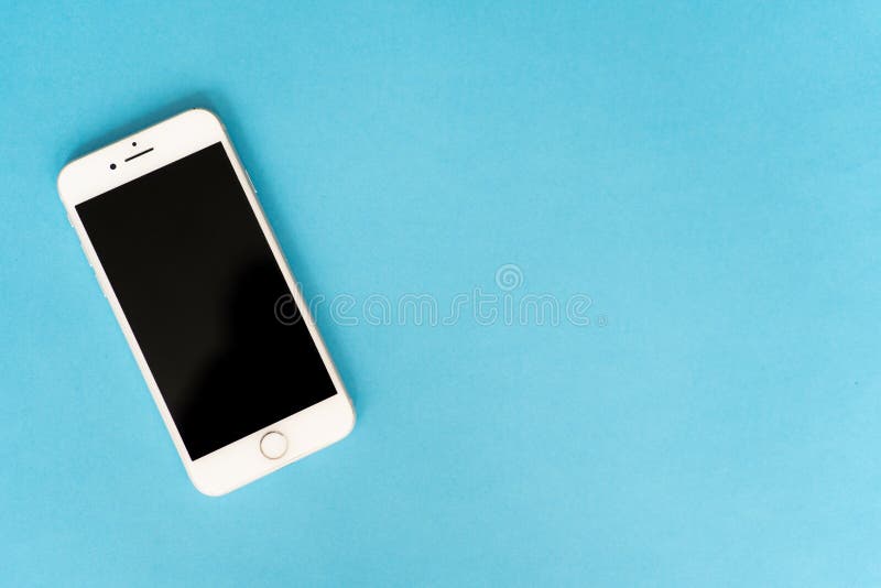 Cell Phone in Blue Background Stock Photo - Image of blue, cell: 154207762