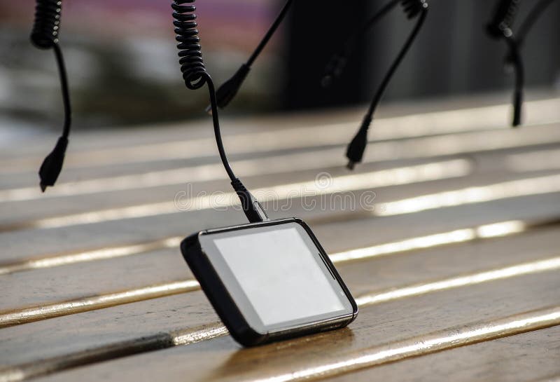 Cell Phone Charging Battery Stock Photo - Image of cord, digital: 84229118