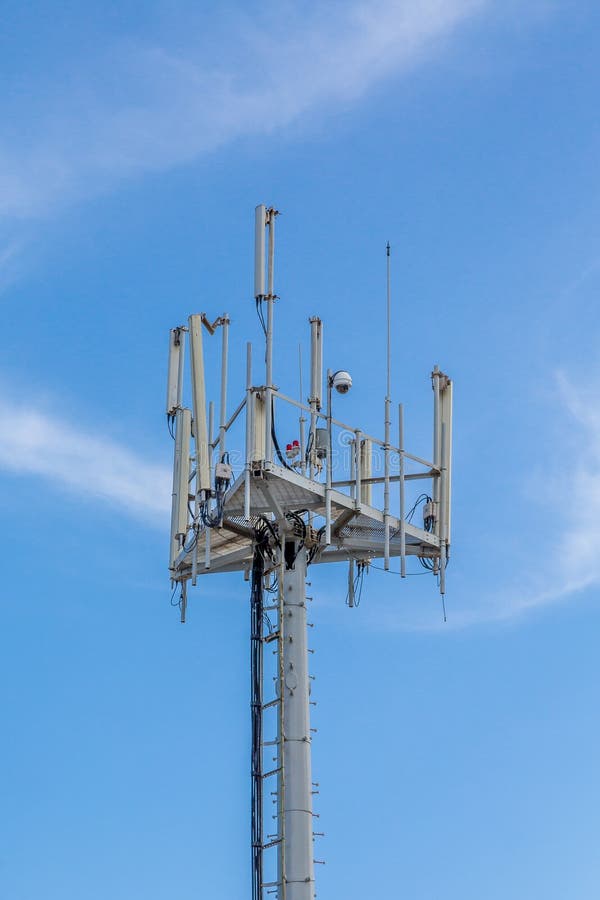 Cell Phone and Communications Tower Stock Photo - Image of ...