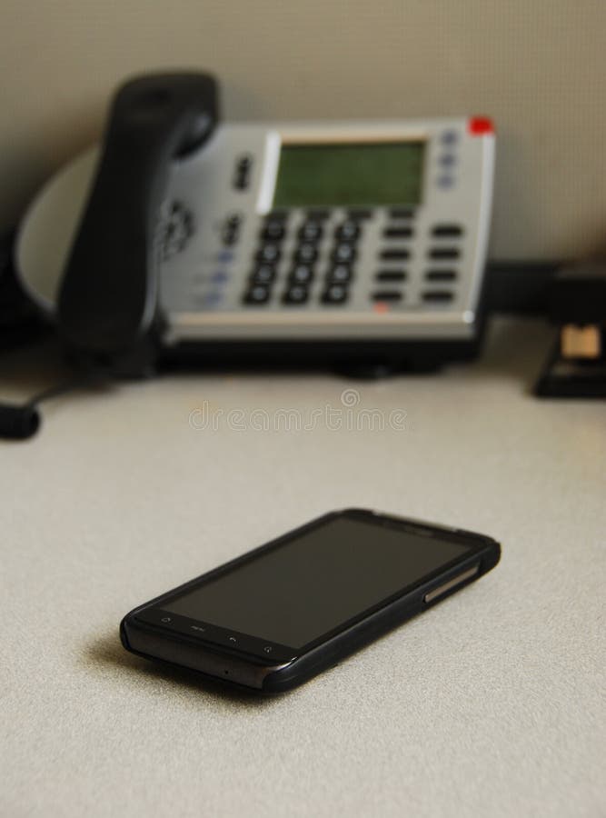 Cell Phone and Desk Phone stock image. Image of front - 40647553