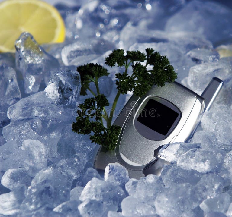 Cell phone on ice stock image. Image of electronic, digital - 1335759