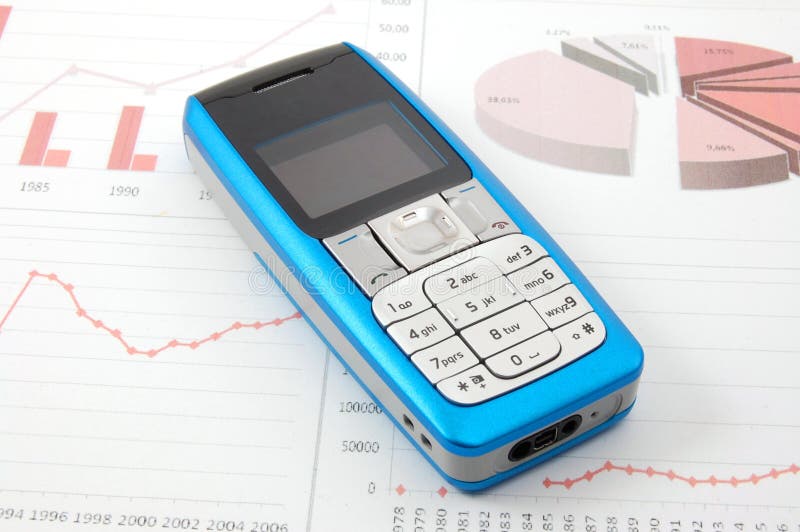 Cell Phone Over Business Chart Stock Image - Image of desk, paper: 7295675