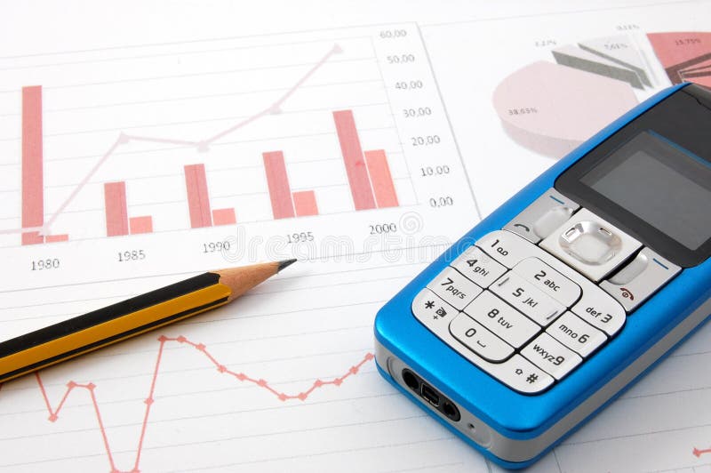 Cell Phone Over Business Chart Stock Photo - Image of business, chart ...