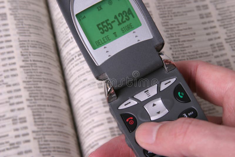 Cell Phone and Phone Book stock photo. Image of number - 284828