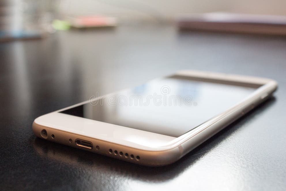 Cell phone on table office stock image. Image of business - 93413023