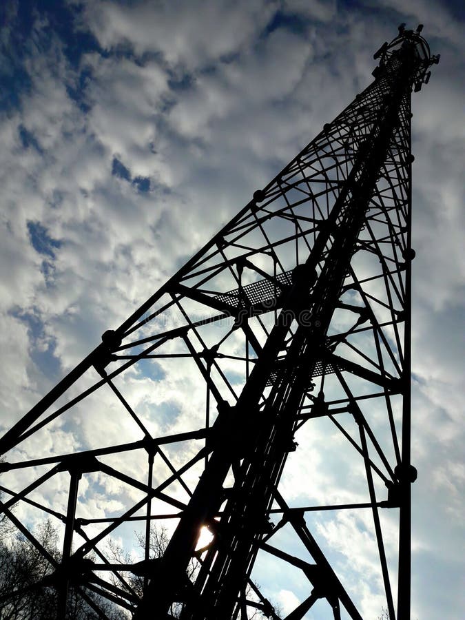 Cell Phone Tower and the Cloudy Sky Stock Image - Image of climbing ...
