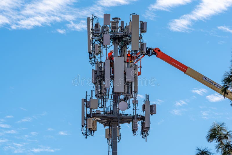 Cell Phone Tower Repair editorial stock photo. Image of internet ...