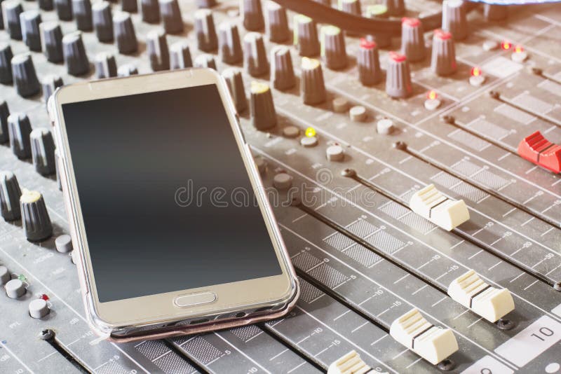 Cell Phones on the Audio Mixer Stock Photo - Image of lifestyle, laptop ...