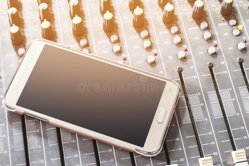 Cell Phones on the Audio Mixer Stock Photo - Image of lifestyle, laptop ...